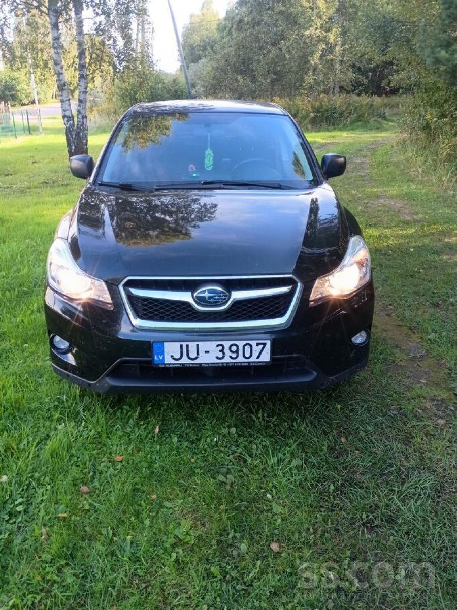 Black Subaru XV 2012 in Valmiera, with an engine capacity of 1.60 L and mileage of 192 thousand km for 6450 €, photo 1 on AUTOMOTO.COM.LV
