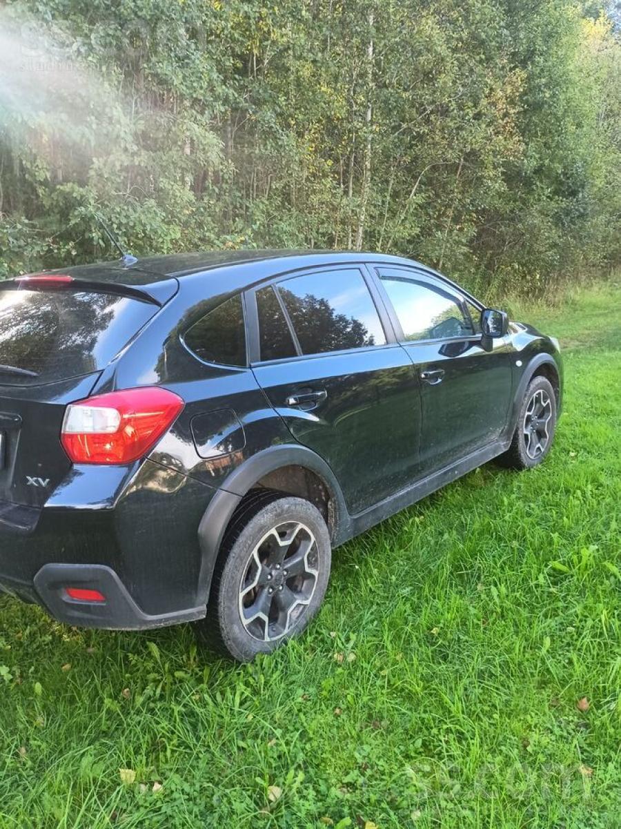 Black Subaru XV 2012 in Valmiera, with an engine capacity of 1.60 L and mileage of 192 thousand km for 6450 €, photo 6 on AUTOMOTO.COM.LV