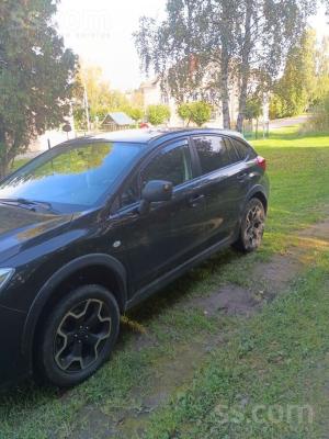 Black Subaru XV 2012 in Valmiera, with an engine capacity of 1.60 L and mileage of 192 thousand km for 6450 €, photo 7 on AUTOMOTO.COM.LV