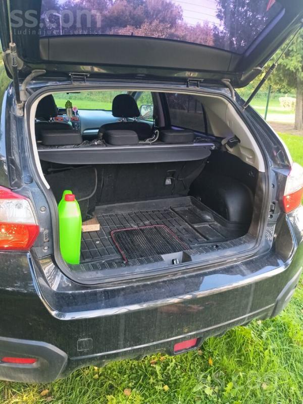 Black Subaru XV 2012 in Valmiera, with an engine capacity of 1.60 L and mileage of 192 thousand km for 6450 €, photo 8 on AUTOMOTO.COM.LV