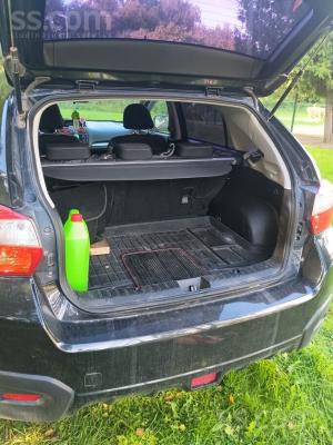 Black Subaru XV 2012 in Valmiera, with an engine capacity of 1.60 L and mileage of 192 thousand km for 6450 €, photo 8 on AUTOMOTO.COM.LV