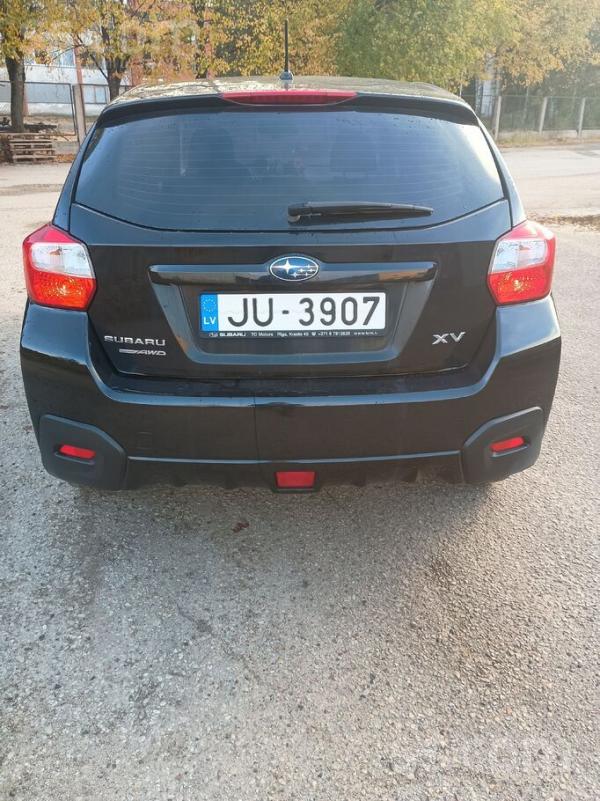 Black Subaru XV 2012 in Valmiera, with an engine capacity of 1.60 L and mileage of 193 thousand km for 6500 €, photo 6 on AUTOMOTO.COM.LV