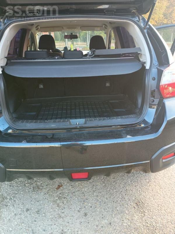 Black Subaru XV 2012 in Valmiera, with an engine capacity of 1.60 L and mileage of 193 thousand km for 6500 €, photo 10 on AUTOMOTO.COM.LV