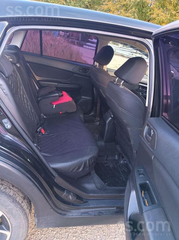Black Subaru XV 2012 in Valmiera, with an engine capacity of 1.60 L and mileage of 193 thousand km for 6500 €, photo 11 on AUTOMOTO.COM.LV