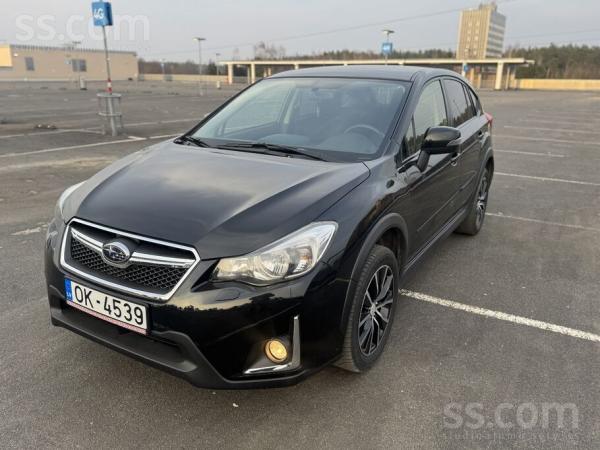 Черный Субару ХВ 2013 в Рига, объемом двигателя 2.00 л и пробегом 215 тыс. км за 7650 €, фото 1 на AUTOMOTO.COM.LV