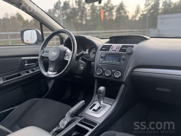Black Subaru XV 2013 in Riga, with an engine capacity of 2.00 L and mileage of 215 thousand km for 7650 €, photo 7 on AUTOMOTO.COM.LV