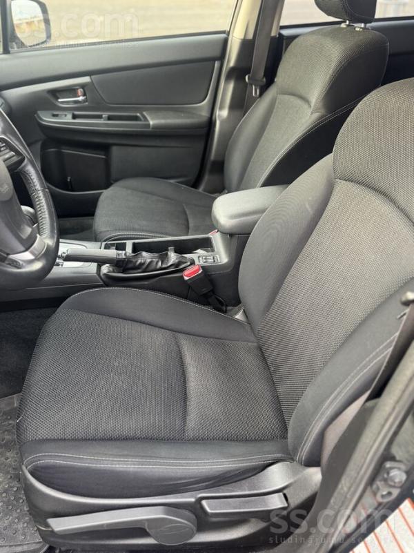 Black Subaru XV 2013 in Riga, with an engine capacity of 2.00 L and mileage of 215 thousand km for 7650 €, photo 10 on AUTOMOTO.COM.LV