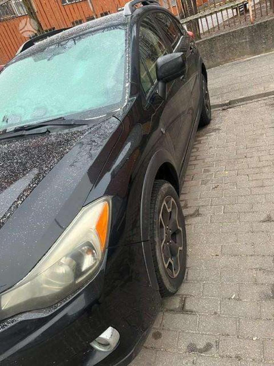 Black Subaru XV 2013 in Vilnius, with an engine capacity of 2.00 L and mileage of 160 thousand km for 6100 €, photo 1 on AUTOMOTO.COM.LV