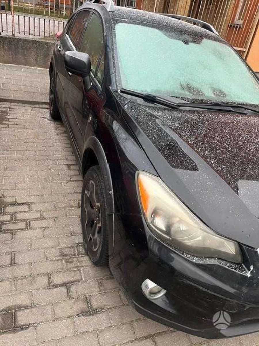 Black Subaru XV 2013 in Vilnius, with an engine capacity of 2.00 L and mileage of 160 thousand km for 6100 €, photo 7 on AUTOMOTO.COM.LV