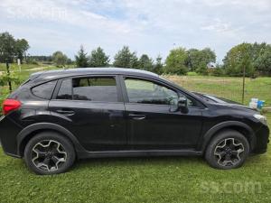 Melns Subaru XV 2013 Rīga, ar dzinēja tilpumu 1.60 L un nobraukumu 200 tūkst. km par 5500 €, foto  vietnē AUTOMOTO.COM.LV