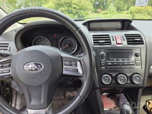 Black Subaru XV 2013 in Riga, with an engine capacity of 1.60 L and mileage of 200 thousand km for 5500 €, photo 3 on AUTOMOTO.COM.LV