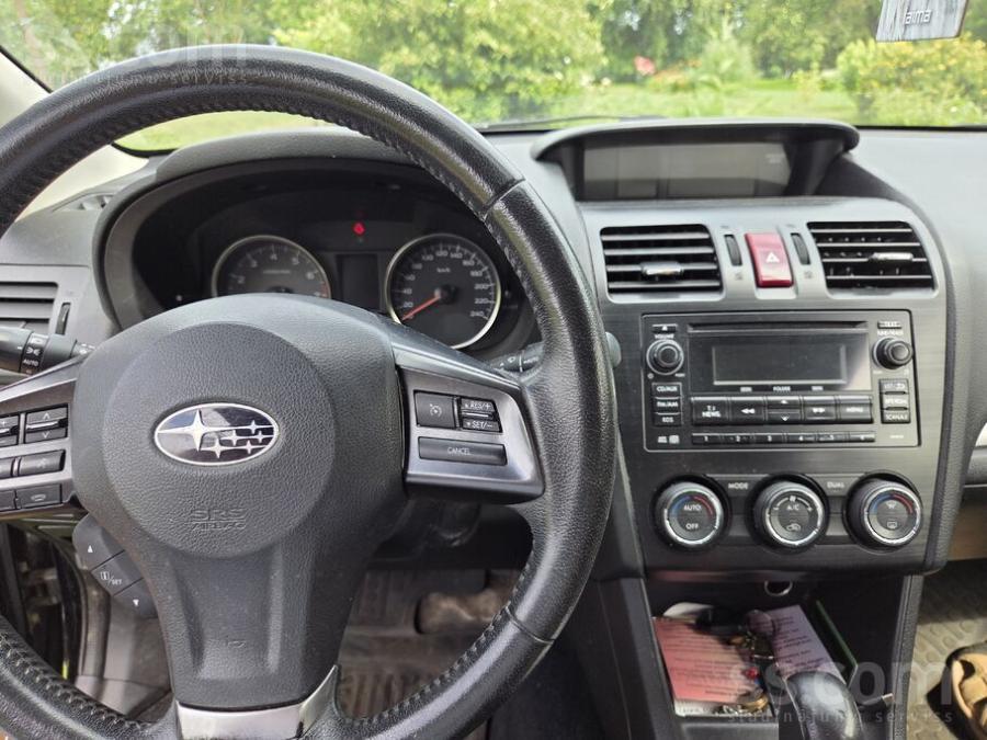 Black Subaru XV 2013 in Riga, with an engine capacity of 1.60 L and mileage of 200 thousand km for 5500 €, photo 3 on AUTOMOTO.COM.LV