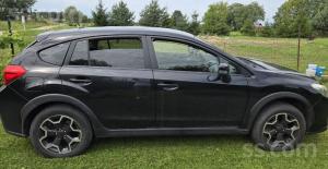 Black Subaru XV 2013 in Riga, with an engine capacity of 1.60 L and mileage of 200 thousand km for 5500 €, photo 5 on AUTOMOTO.COM.LV