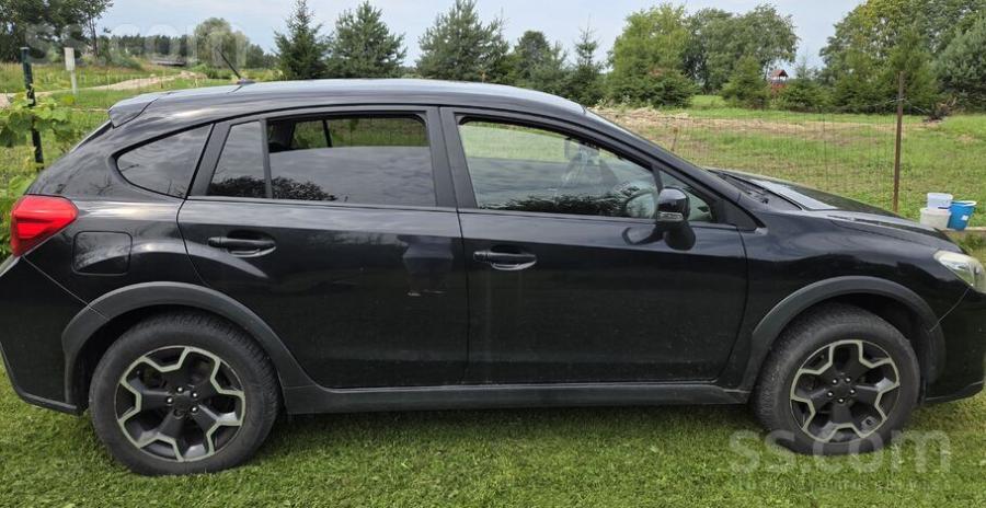 Black Subaru XV 2013 in Riga, with an engine capacity of 1.60 L and mileage of 200 thousand km for 5500 €, photo 5 on AUTOMOTO.COM.LV