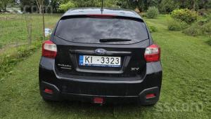 Black Subaru XV 2013 in Riga, with an engine capacity of 1.60 L and mileage of 200 thousand km for 5500 €, photo 6 on AUTOMOTO.COM.LV