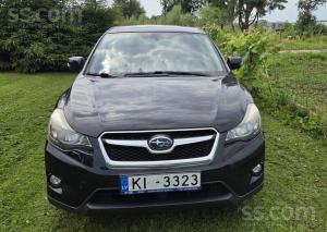 Black Subaru XV 2013 in Riga, with an engine capacity of 1.60 L and mileage of 200 thousand km for 5500 €, photo 7 on AUTOMOTO.COM.LV