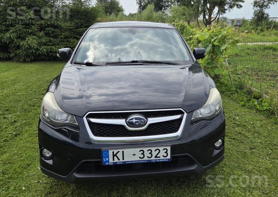 Black Subaru XV 2013 in Riga, with an engine capacity of 1.60 L and mileage of 200 thousand km for 5500 €, photo 7 on AUTOMOTO.COM.LV