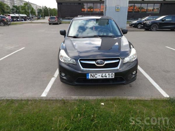 Black Subaru XV 2014 in Riga, with an engine capacity of 2.00 L and mileage of 218 thousand km for 6600 €, photo 5 on AUTOMOTO.COM.LV