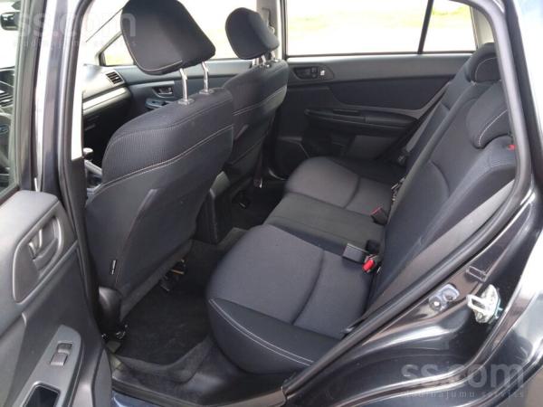 Black Subaru XV 2014 in Riga, with an engine capacity of 2.00 L and mileage of 218 thousand km for 6600 €, photo 8 on AUTOMOTO.COM.LV