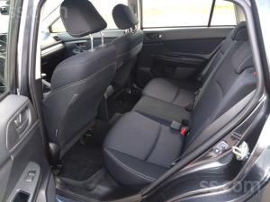 Black Subaru XV 2014 in Riga, with an engine capacity of 2.00 L and mileage of 218 thousand km for 6600 €, photo 9 on AUTOMOTO.COM.LV