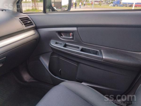 Black Subaru XV 2014 in Riga, with an engine capacity of 2.00 L and mileage of 218 thousand km for 6600 €, photo 9 on AUTOMOTO.COM.LV