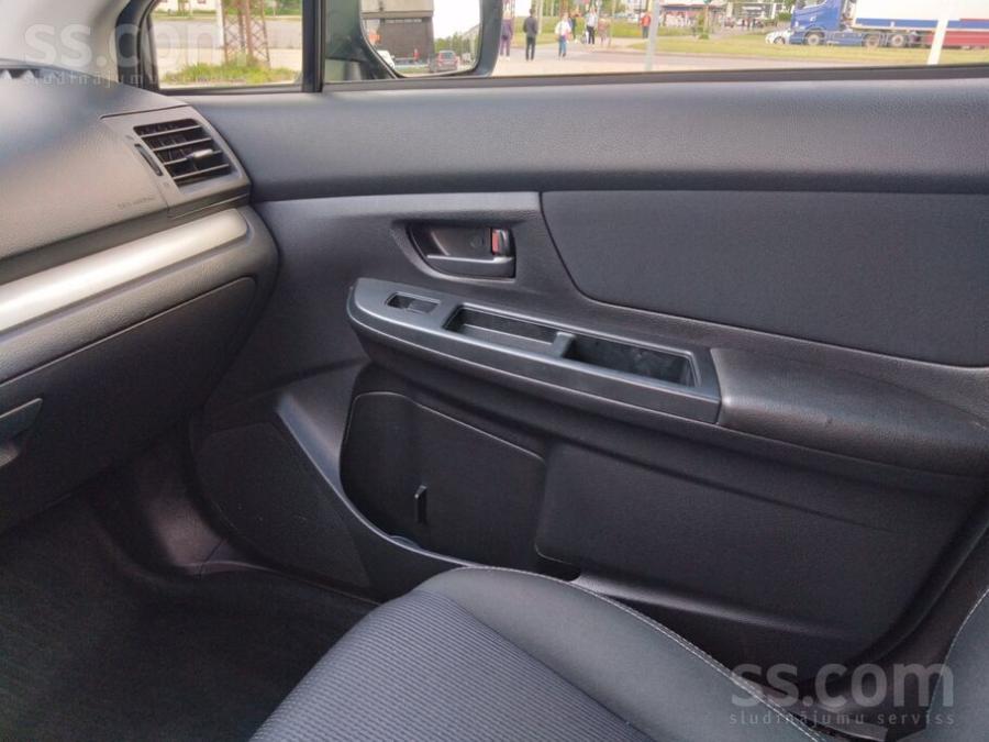 Black Subaru XV 2014 in Riga, with an engine capacity of 2.00 L and mileage of 218 thousand km for 6600 €, photo 10 on AUTOMOTO.COM.LV