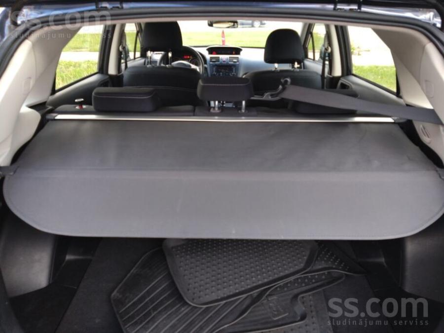 Black Subaru XV 2014 in Riga, with an engine capacity of 2.00 L and mileage of 218 thousand km for 6600 €, photo 12 on AUTOMOTO.COM.LV