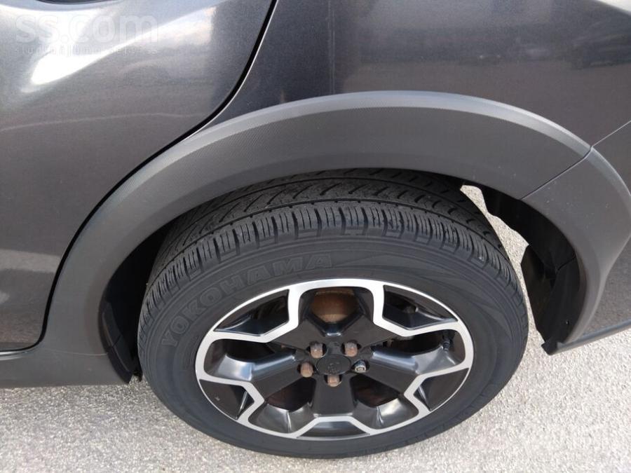 Black Subaru XV 2014 in Riga, with an engine capacity of 2.00 L and mileage of 218 thousand km for 6600 €, photo 16 on AUTOMOTO.COM.LV