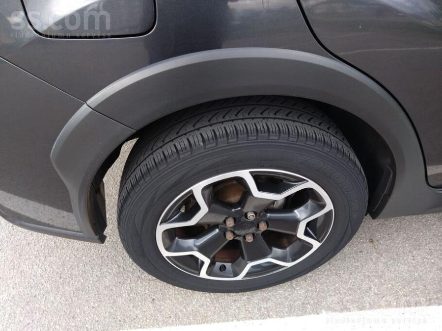 Black Subaru XV 2014 in Riga, with an engine capacity of 2.00 L and mileage of 218 thousand km for 6600 €, photo 18 on AUTOMOTO.COM.LV
