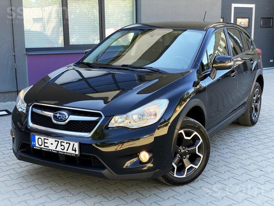 Black Subaru XV 2015 in Riga, with an engine capacity of 2.00 L and mileage of 228 thousand km for 6900 €, photo 1 on AUTOMOTO.COM.LV