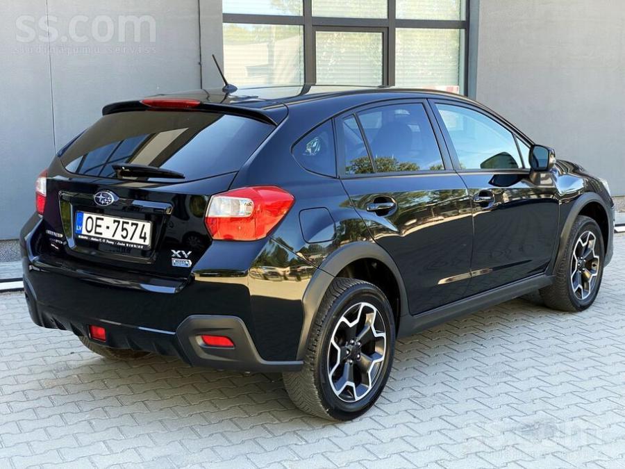 Black Subaru XV 2015 in Riga, with an engine capacity of 2.00 L and mileage of 228 thousand km for 6900 €, photo 7 on AUTOMOTO.COM.LV