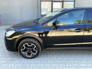 Black Subaru XV 2015 in Riga, with an engine capacity of 2.00 L and mileage of 228 thousand km for 6900 €, photo 29 on AUTOMOTO.COM.LV