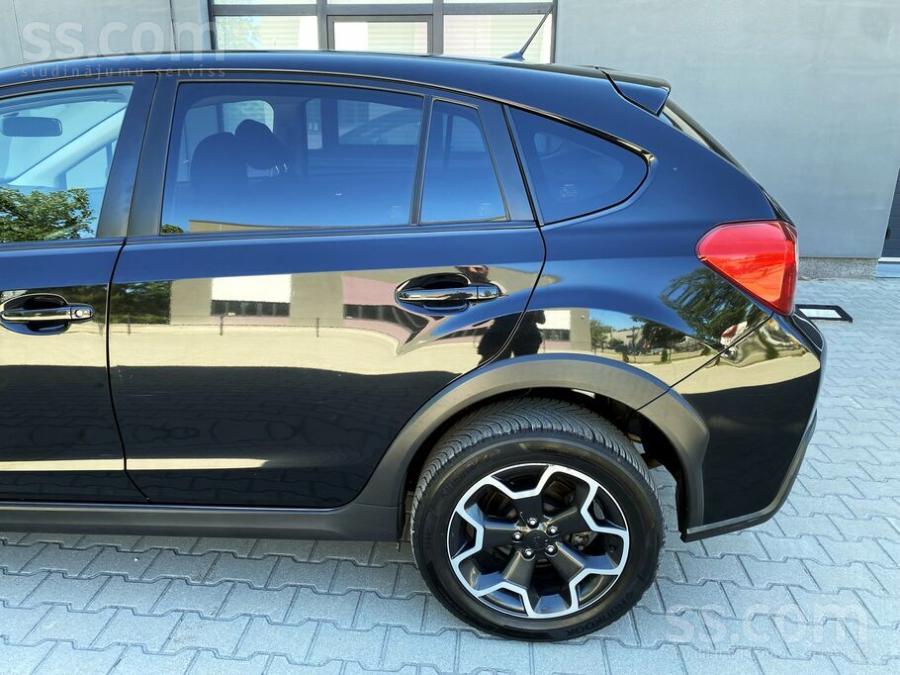 Black Subaru XV 2015 in Riga, with an engine capacity of 2.00 L and mileage of 228 thousand km for 6900 €, photo 30 on AUTOMOTO.COM.LV