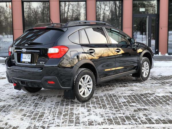Black Subaru XV 2015 in Vilnius, with an engine capacity of 1.99 L and mileage of 116 thousand km for 7700 €, photo 4 on AUTOMOTO.COM.LV