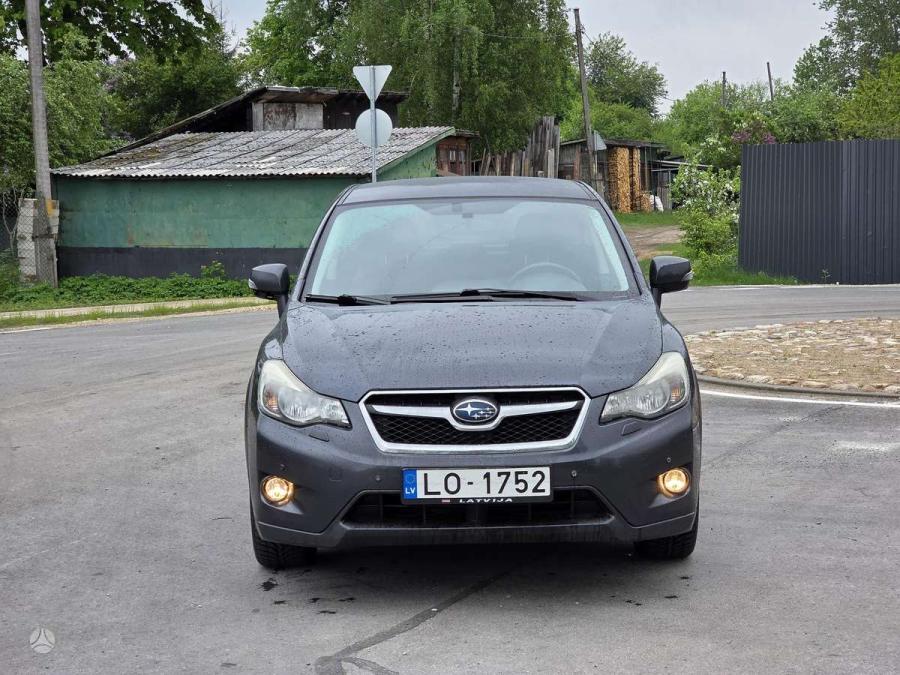 Black Subaru XV 2014 in Riga, with an engine capacity of 2.00 L and mileage of 282 thousand km for 5300 €, photo 3 on AUTOMOTO.COM.LV