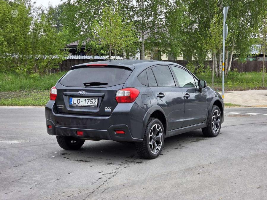 Black Subaru XV 2014 in Riga, with an engine capacity of 2.00 L and mileage of 282 thousand km for 5300 €, photo 5 on AUTOMOTO.COM.LV