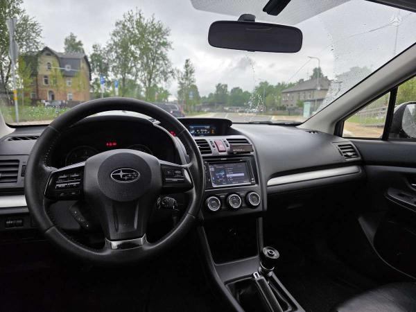 Black Subaru XV 2014 in Riga, with an engine capacity of 2.00 L and mileage of 282 thousand km for 5300 €, photo 7 on AUTOMOTO.COM.LV