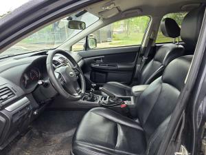 Black Subaru XV 2014 in Riga, with an engine capacity of 2.00 L and mileage of 282 thousand km for 5300 €, photo 9 on AUTOMOTO.COM.LV