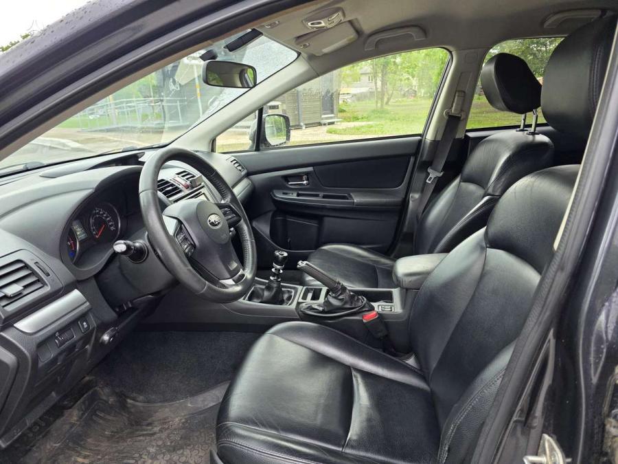 Black Subaru XV 2014 in Riga, with an engine capacity of 2.00 L and mileage of 282 thousand km for 5300 €, photo 9 on AUTOMOTO.COM.LV