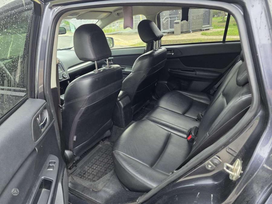 Black Subaru XV 2014 in Riga, with an engine capacity of 2.00 L and mileage of 282 thousand km for 5300 €, photo 11 on AUTOMOTO.COM.LV