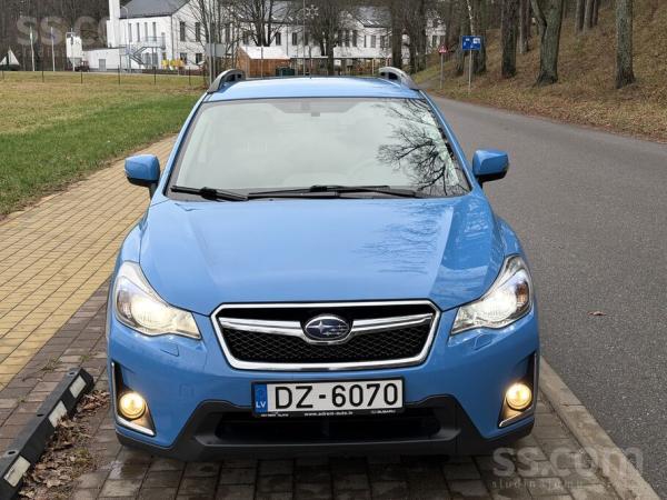 Blue Subaru XV 2016 in Riga, with an engine capacity of 2.00 L and mileage of 156 thousand km for 12000 €, photo 2 on AUTOMOTO.COM.LV