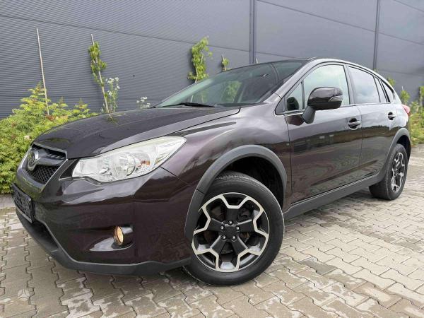 Brown Subaru XV 2013 in Vilnius, with an engine capacity of 1.60 L and mileage of 160 thousand km for 6990 €, photo 1 on AUTOMOTO.COM.LV