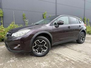 Brown Subaru XV 2013 in Vilnius, with an engine capacity of 1.60 L and mileage of 160 thousand km for 6990 €, photo 3 on AUTOMOTO.COM.LV