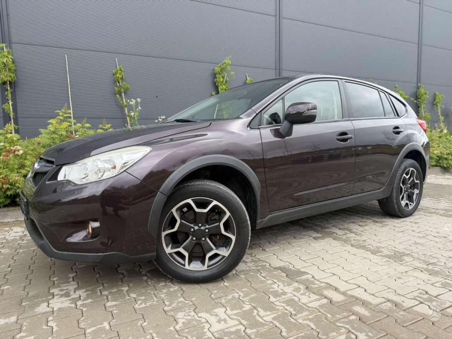 Brown Subaru XV 2013 in Vilnius, with an engine capacity of 1.60 L and mileage of 160 thousand km for 6990 €, photo 3 on AUTOMOTO.COM.LV