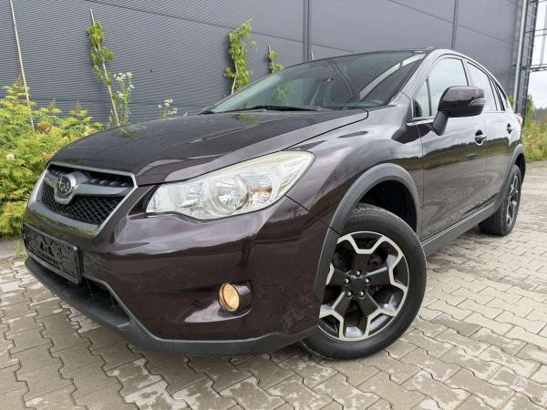 Brown Subaru XV 2013 in Vilnius, with an engine capacity of 1.60 L and mileage of 160 thousand km for 6990 €, photo 3 on AUTOMOTO.COM.LV