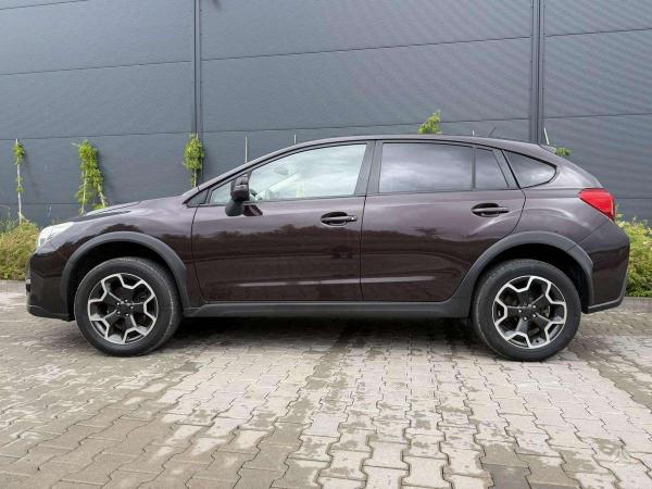 Brown Subaru XV 2013 in Vilnius, with an engine capacity of 1.60 L and mileage of 160 thousand km for 6990 €, photo 4 on AUTOMOTO.COM.LV