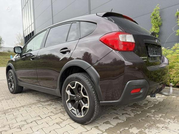 Brown Subaru XV 2013 in Vilnius, with an engine capacity of 1.60 L and mileage of 160 thousand km for 6990 €, photo 5 on AUTOMOTO.COM.LV