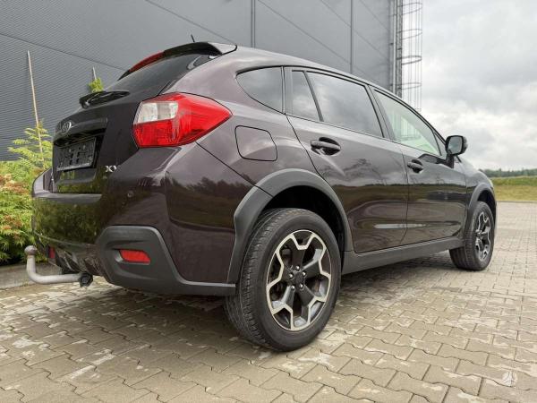 Brown Subaru XV 2013 in Vilnius, with an engine capacity of 1.60 L and mileage of 160 thousand km for 6990 €, photo 6 on AUTOMOTO.COM.LV