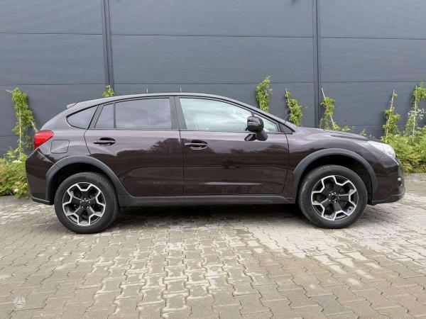 Brown Subaru XV 2013 in Vilnius, with an engine capacity of 1.60 L and mileage of 160 thousand km for 6990 €, photo 7 on AUTOMOTO.COM.LV