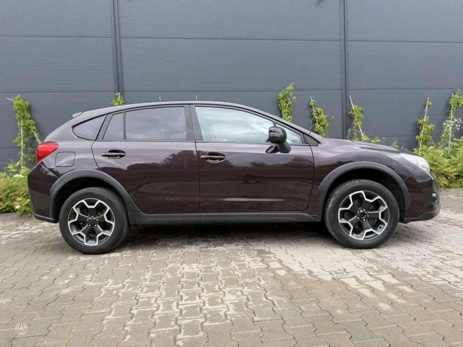 Brown Subaru XV 2013 in Vilnius, with an engine capacity of 1.60 L and mileage of 160 thousand km for 6990 €, photo 8 on AUTOMOTO.COM.LV